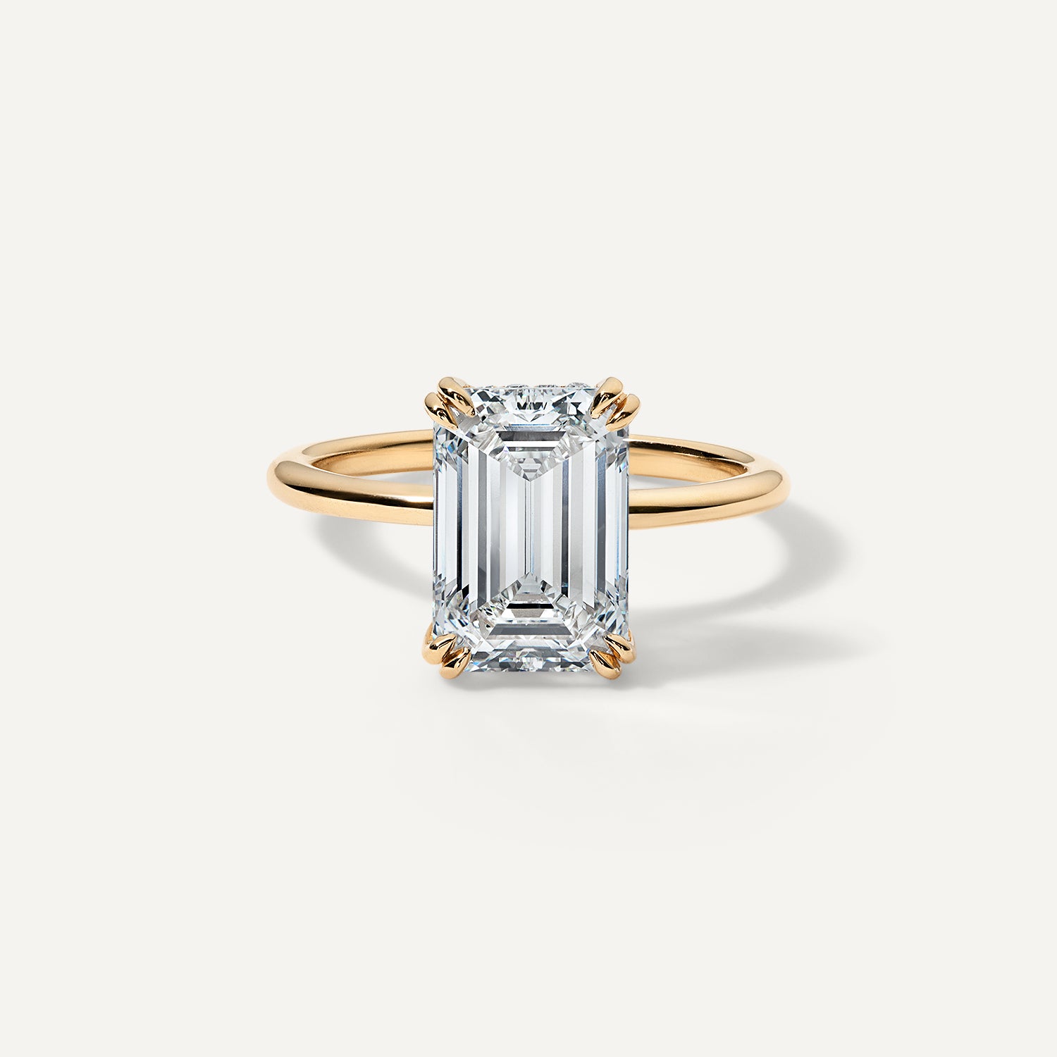 Double Claw Emerald Cut – Her Rock