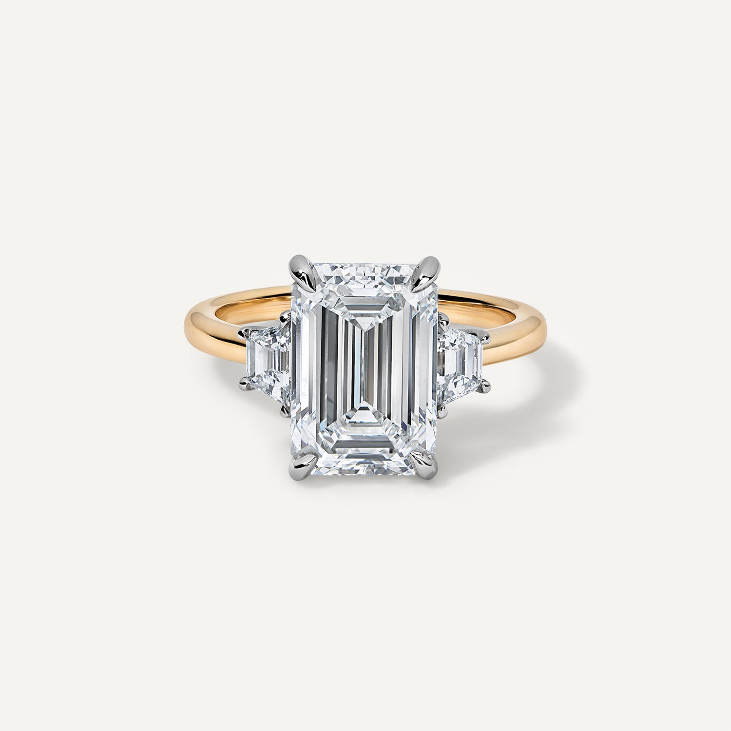 Three Stone Emerald Cut with Step Cut Trapezoids – Her Rock